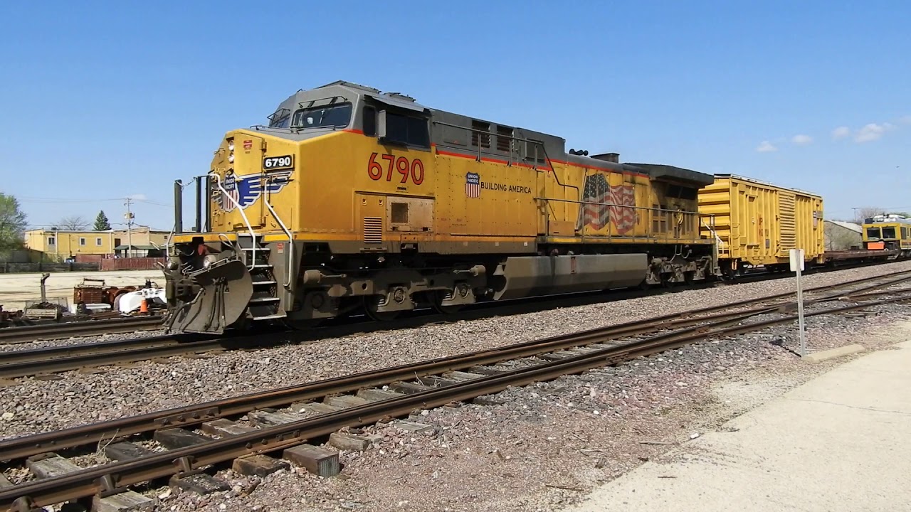 UP 6790 a C44AC leads UP EC-4 a Geometry Car west through Sterling IL - YouTube