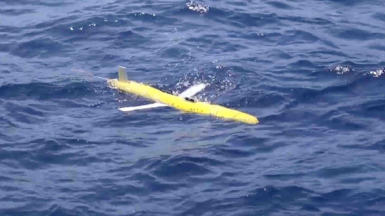 China's newly developed underwater glider passes joint test - YouTube