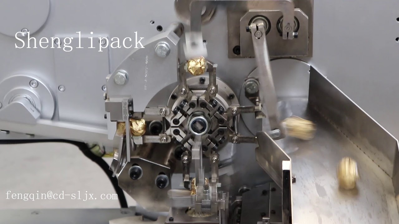ferrero rocher chocolate wrapping machine - YouTube