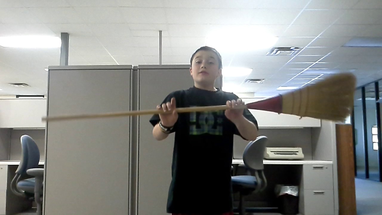 How to balance a broom on one finger - YouTube