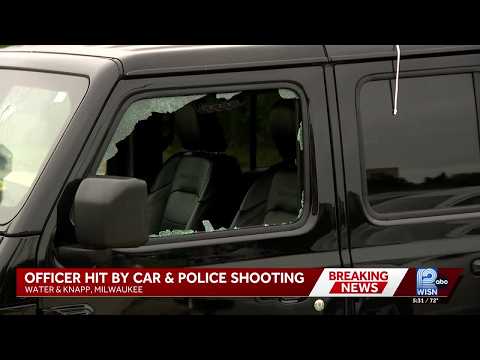 MPD: Milwaukee officer hit by car downtown, police shoot suspect