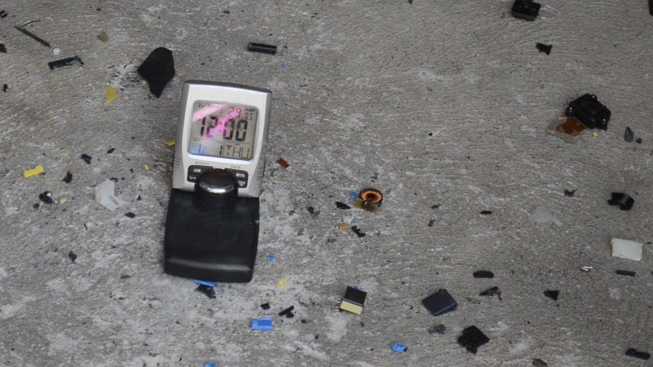 Smashing a Portable Alarm Clock - YouTube