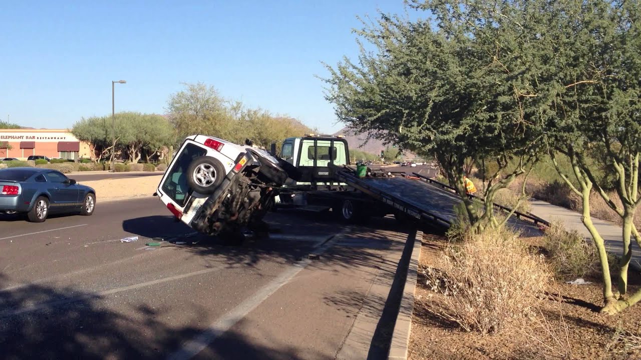 Land Rover flipped back after accident - YouTube