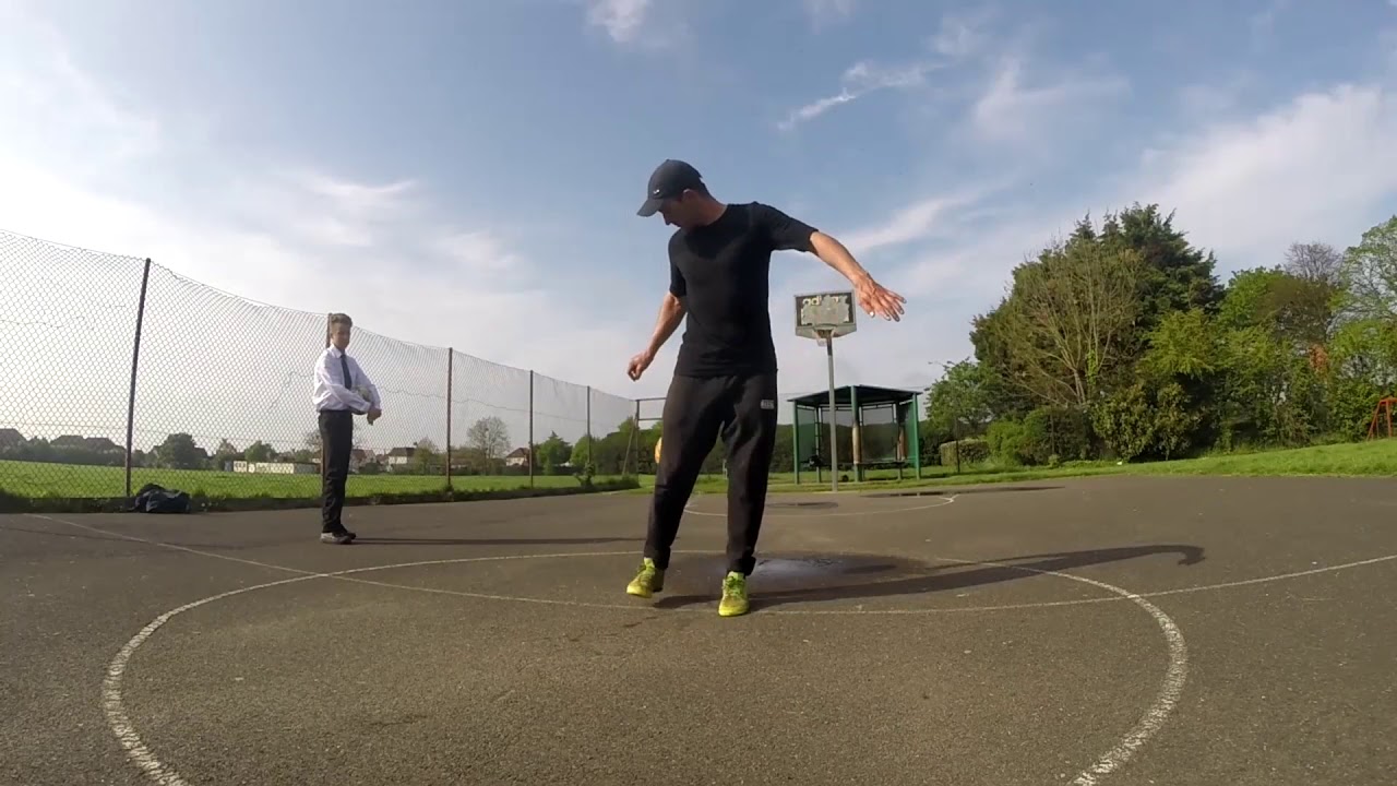 Guy Shows Off Awesome Skills By Kicking A Ball Into The Basket Hoop ...