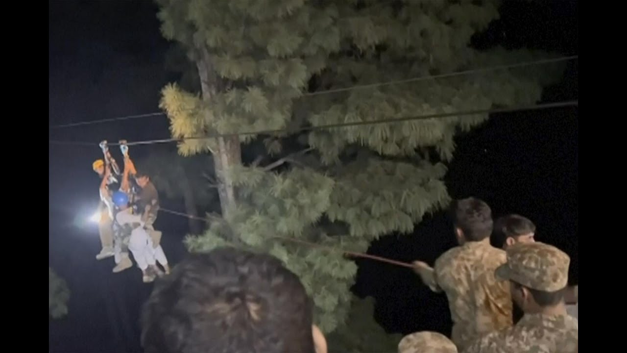 Rescuers save 8 people trapped in cable car dangling above canyon in ...