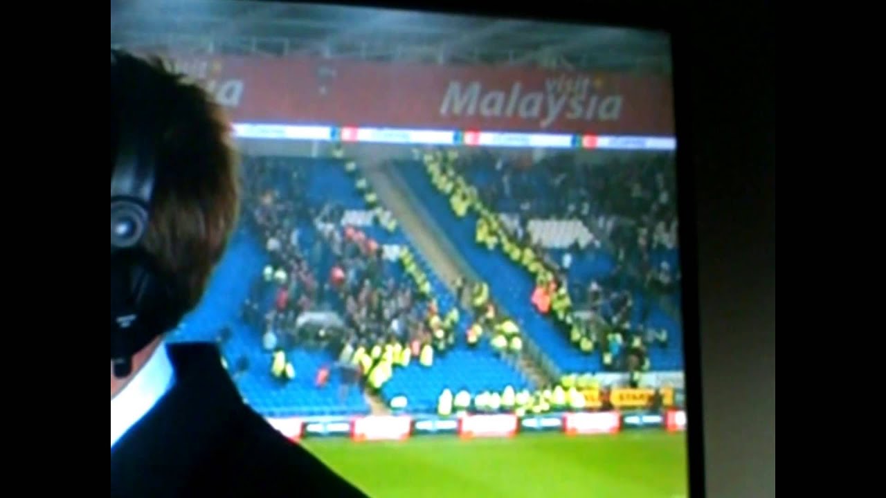 cardiff vs swansea hooligans in stands on live tele - YouTube