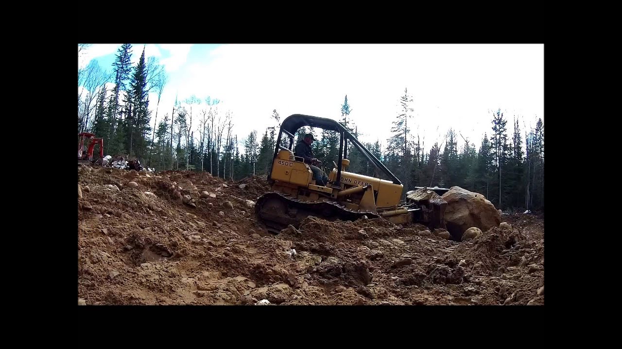 1974 JD450 C non-Turbo pushing a large rock - YouTube