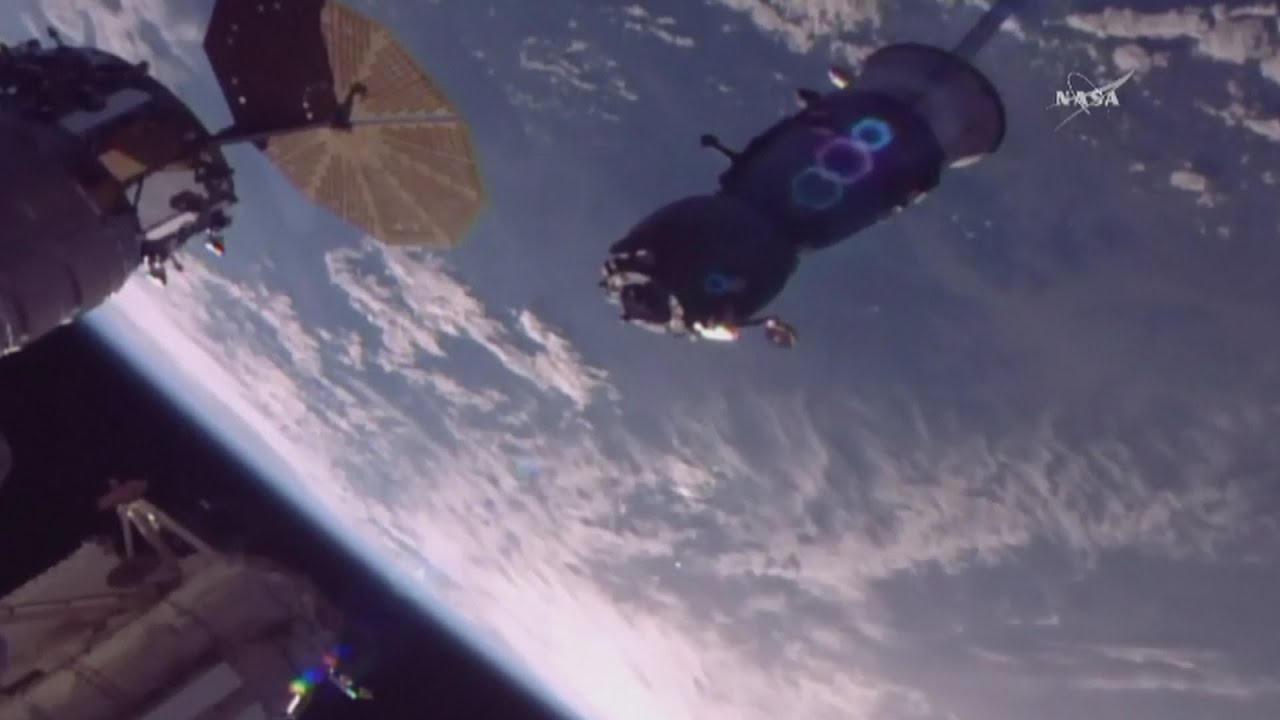 Astronauts land back on Earth after 196 days in space - YouTube