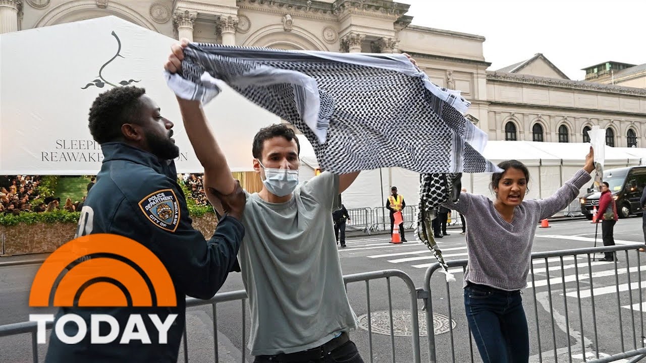 Anti-war protesters target Met Gala as colleges cancel graduation - YouTube