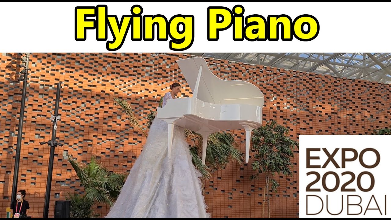 Flying Piano| Expo Piano Flying | Amazing performance by Eleonora ...