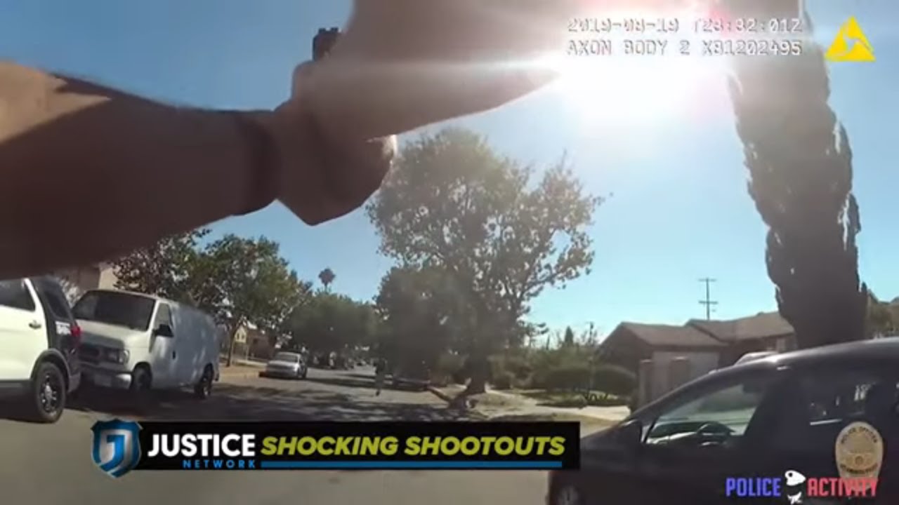 Bodycam shows police officers in running gun battle on public street in ...