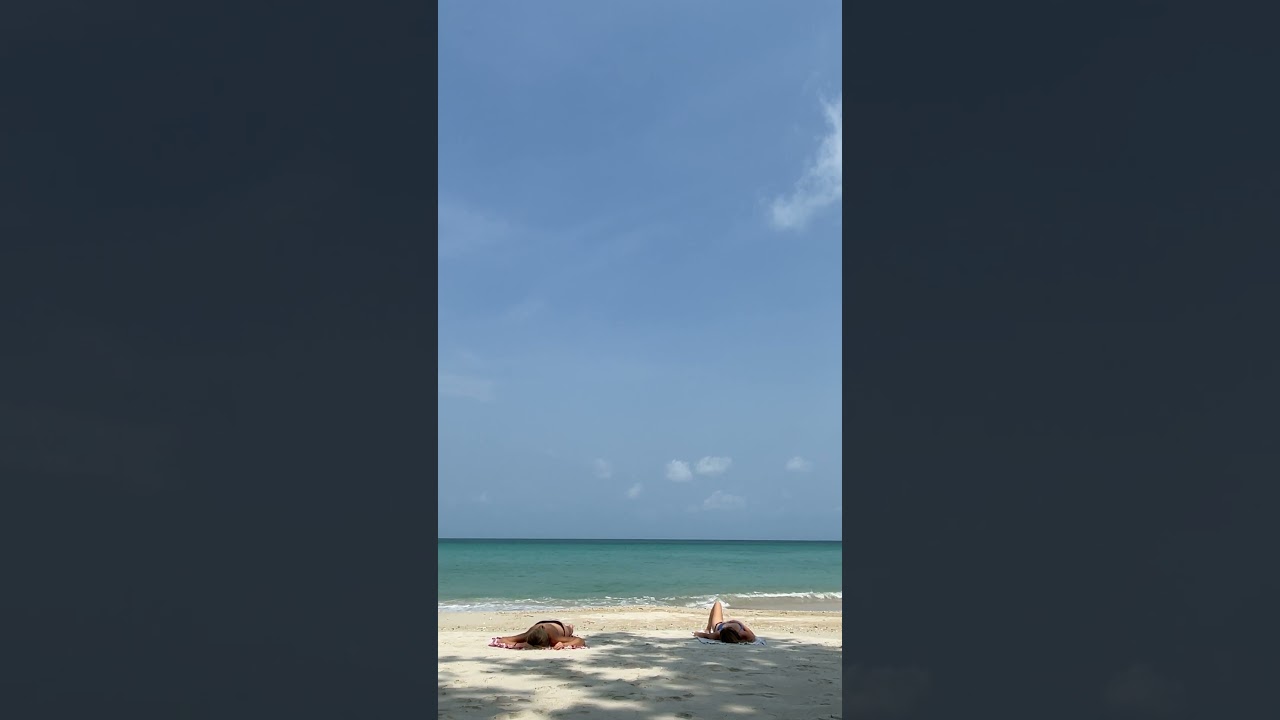 Sun Bathing on the Beach - YouTube