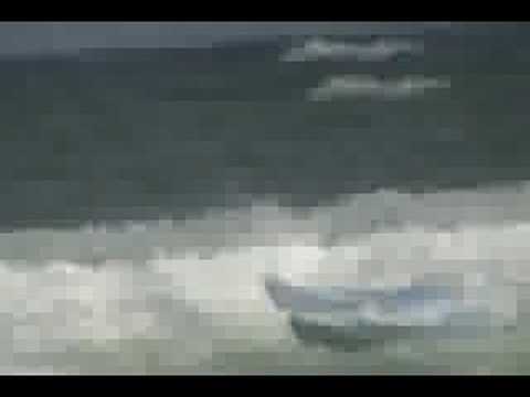 man falls off boat - YouTube