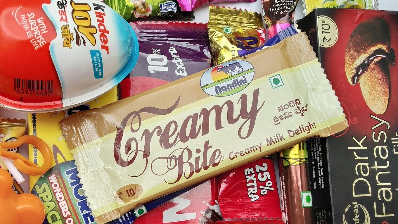 Sweet n delish nandini creamy bite chocolate opening - YouTube