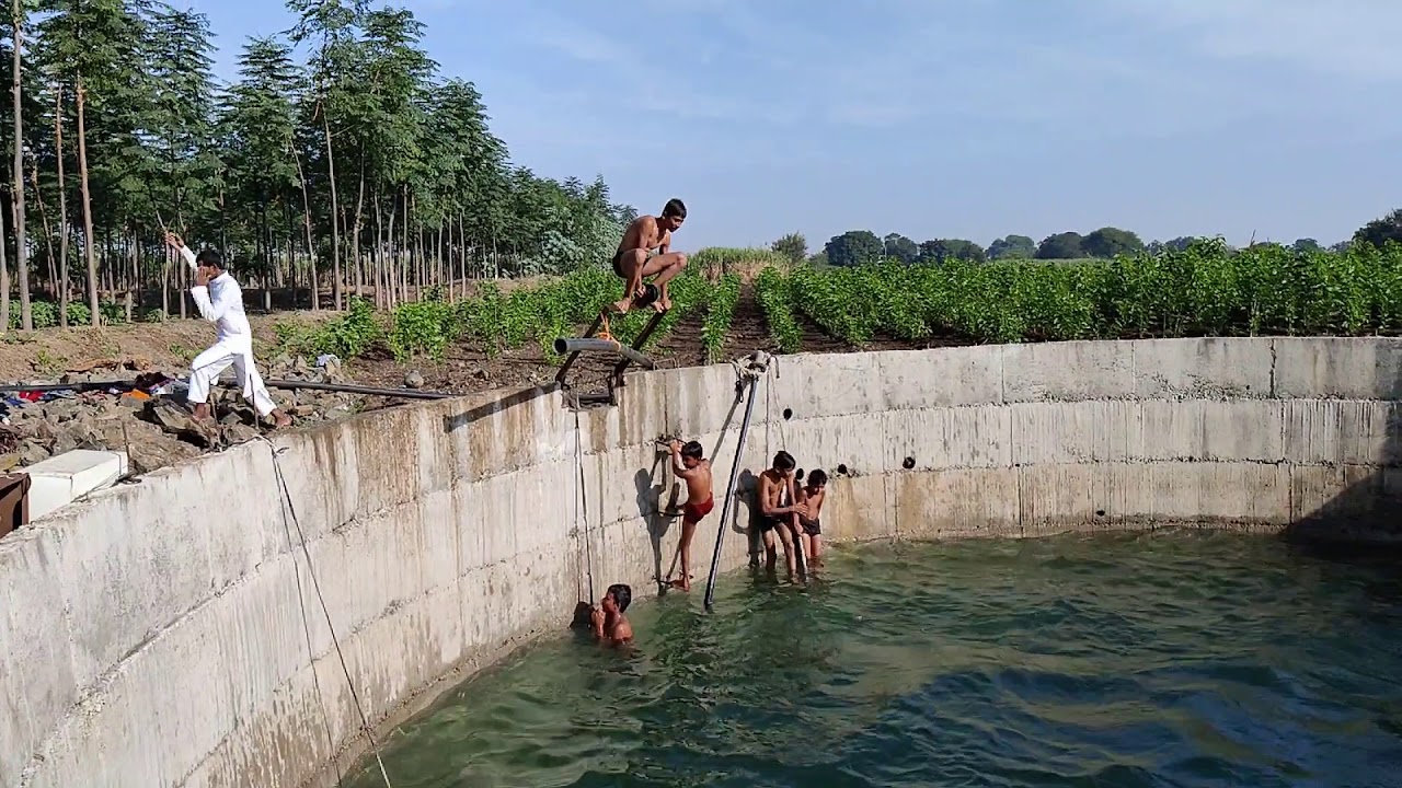 pure desi swimming pool video||swimming in deep well swimming with ...