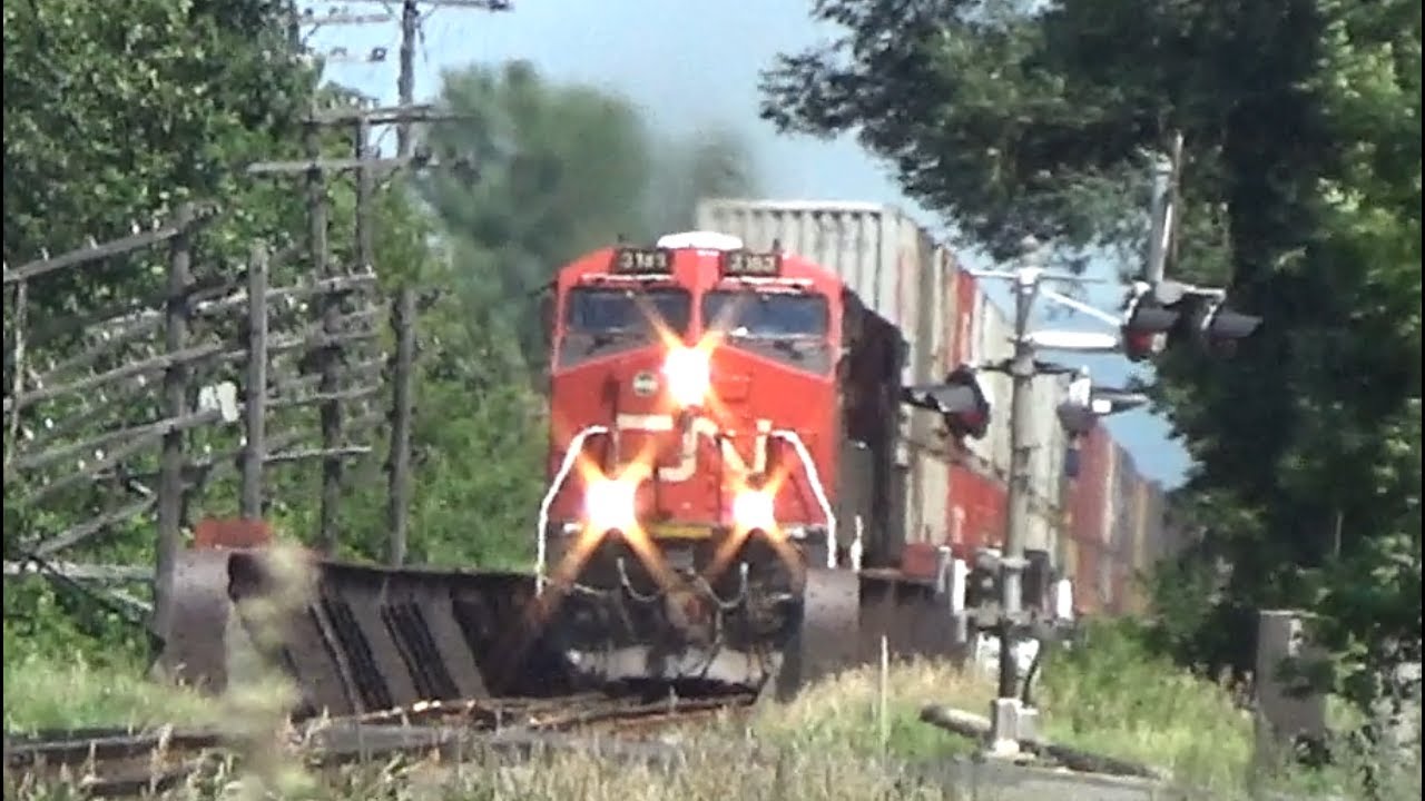Long Stack Train CN 121 w/DPU Rolling thru Montmagny, Quebec at Track Speed - YouTube