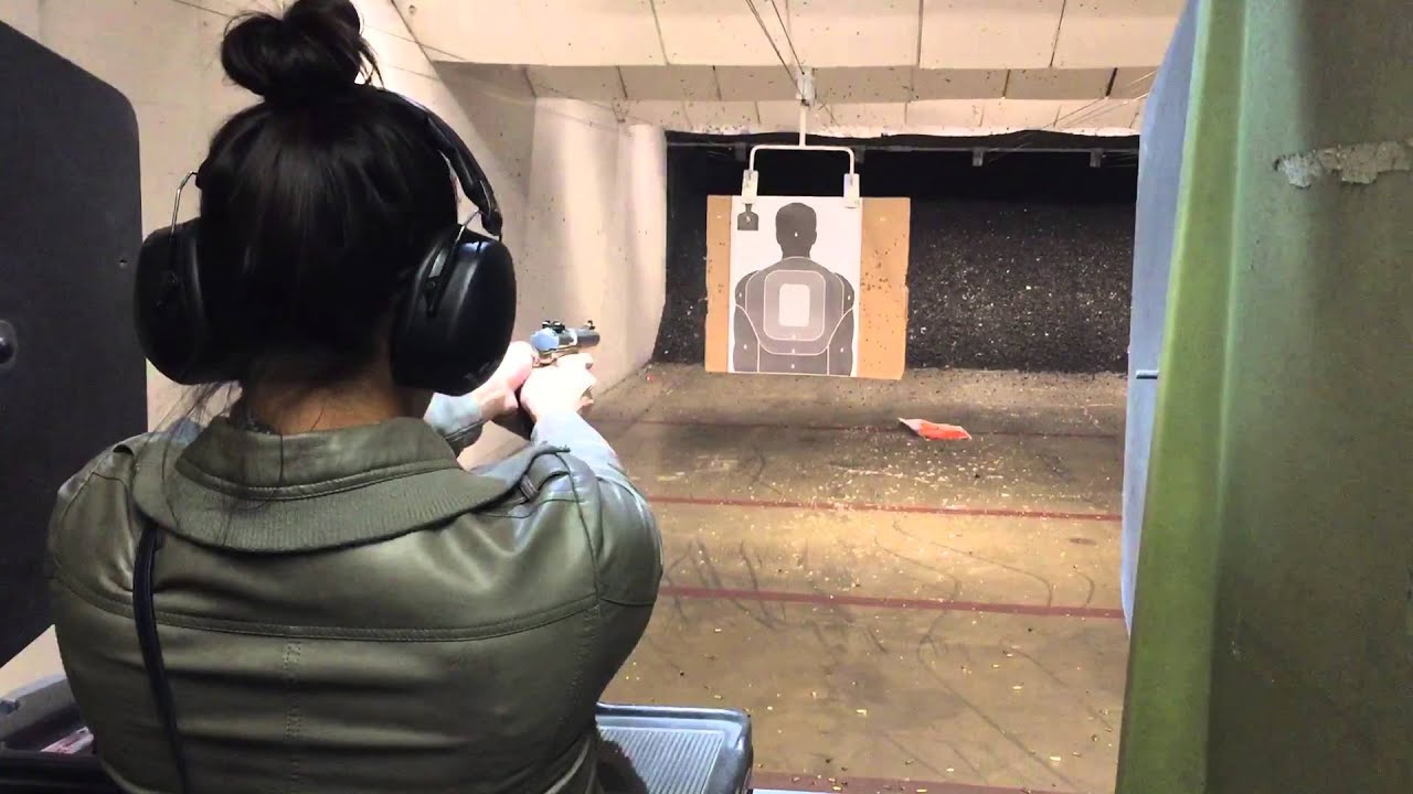Erica's first time a the gun range - YouTube