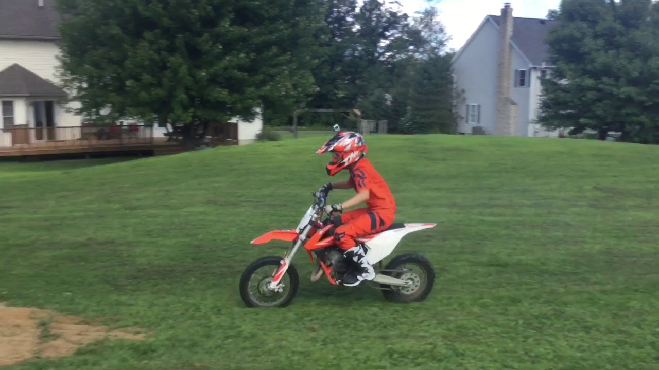 KTM 65 and TTR90 hitting jump - YouTube