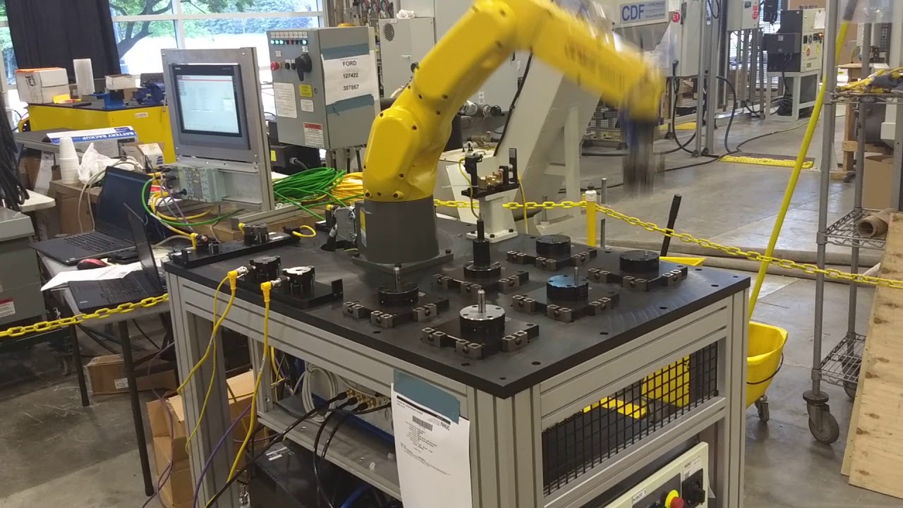 Air Gaging LLC robotic measuring station utilizing Fanuc robot and ...