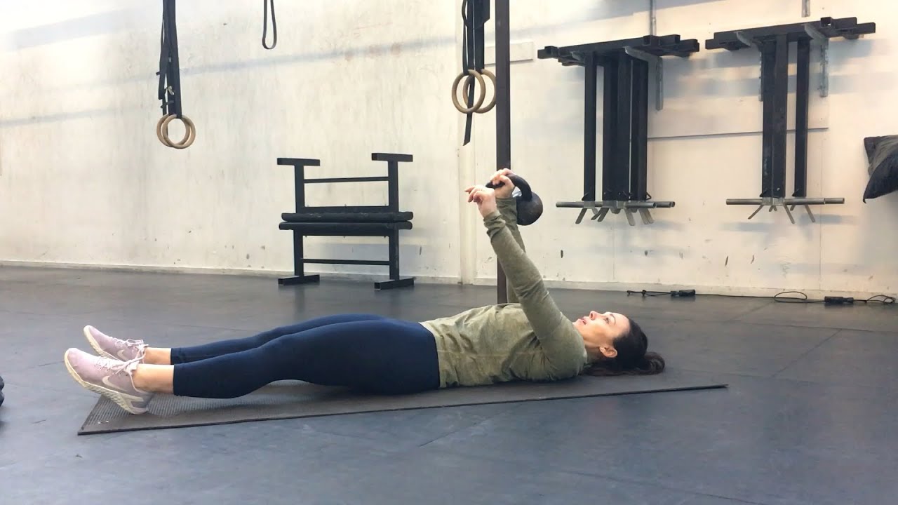 Single arm kb turkish sit up with a press - YouTube