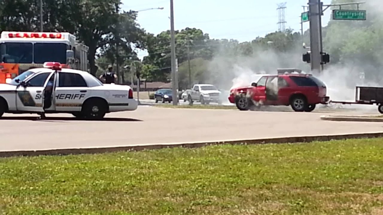 Car catches fire in fire department's parking lot. - YouTube