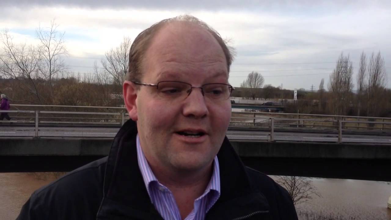 Gloucester mayor Chris Chatterton surveys the River Severn flooding ...