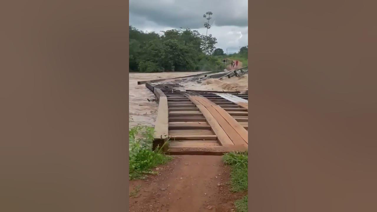 Flash floods wash away wooden bridge - YouTube