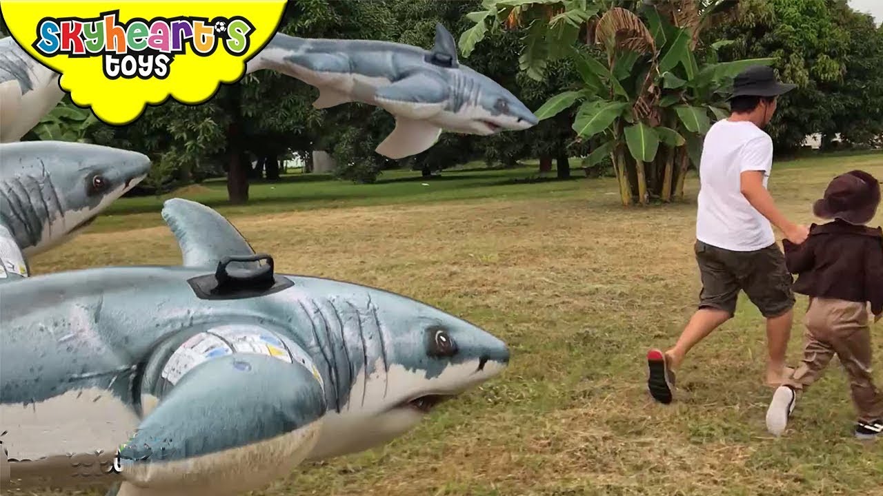 FLYING SHARKS vs Toddler | Skyheart battles an army of sharks for kids ...