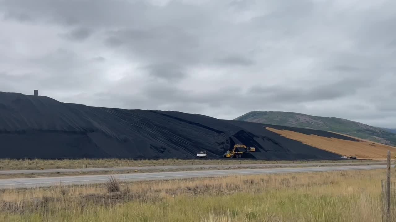 Watch now: Cleaning up Anaconda’s black slag piles - YouTube