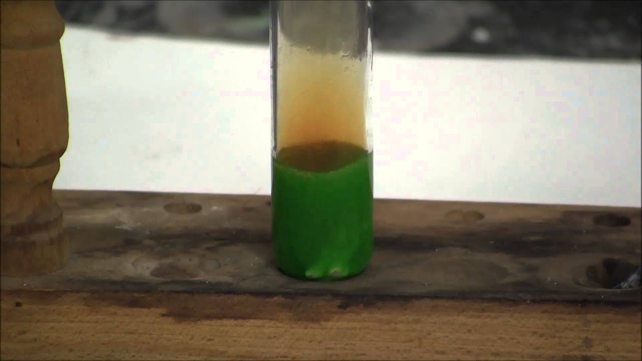 Copper reacts with concentrated nitric acid - YouTube