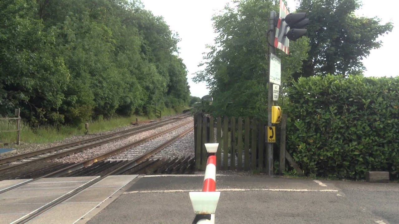 Dunhampstead level crossing (28/06/15) - YouTube