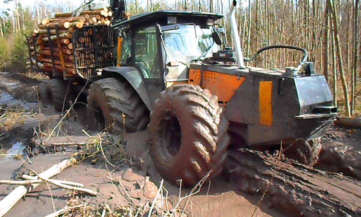 Valtra forestry tractor with big, fully loaded trailer - YouTube