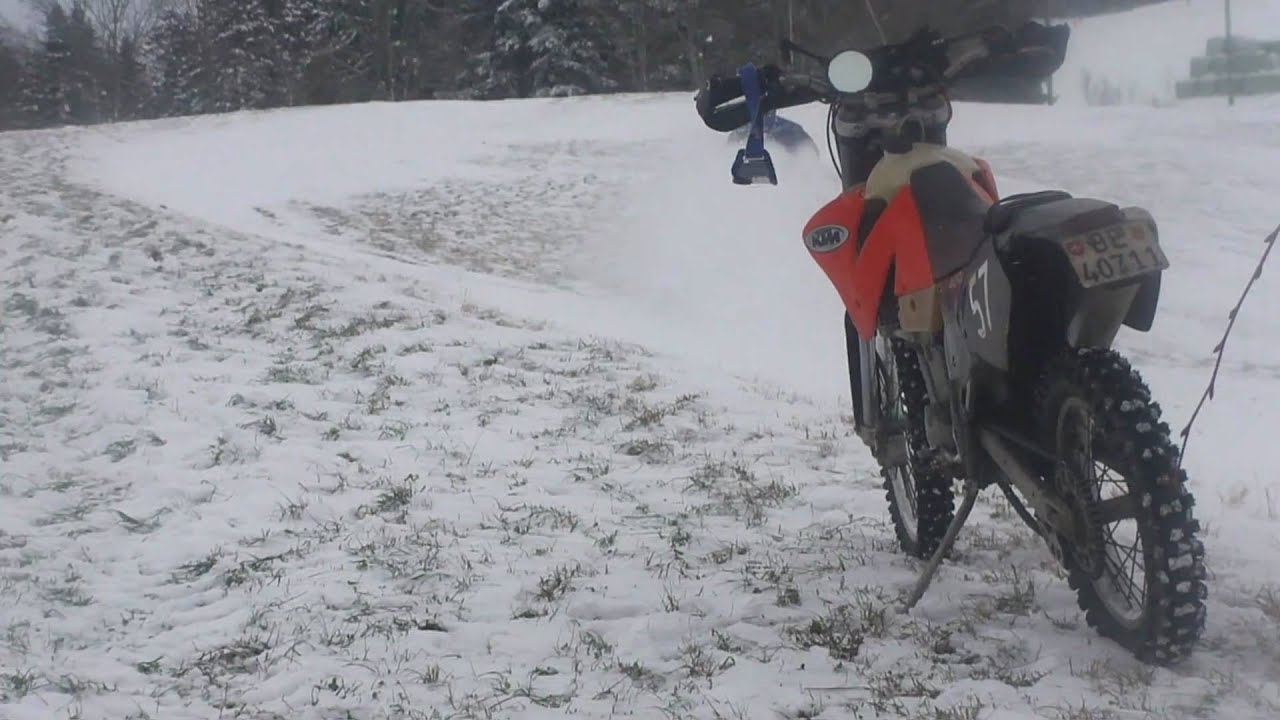 Motorbike in snow - YouTube