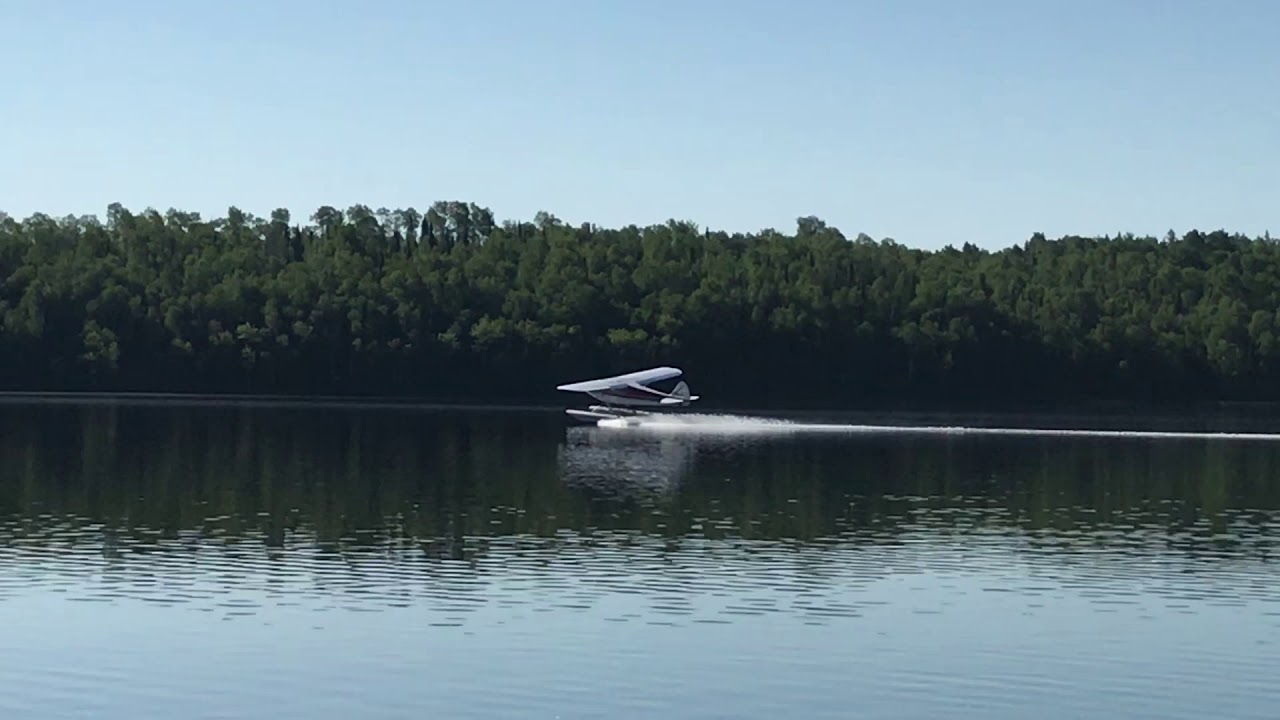 PA12 floatplane taking off in Canada - YouTube