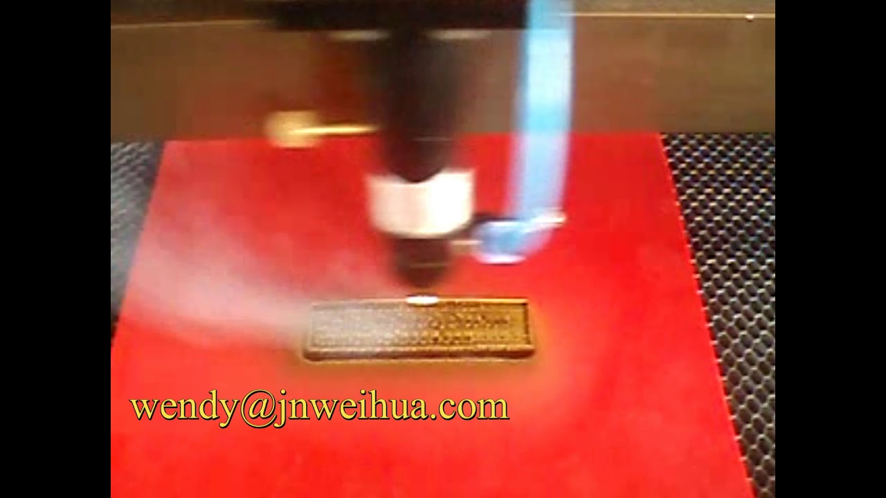 Rubber engraving by CO2 Laser engraving cutting machine - YouTube