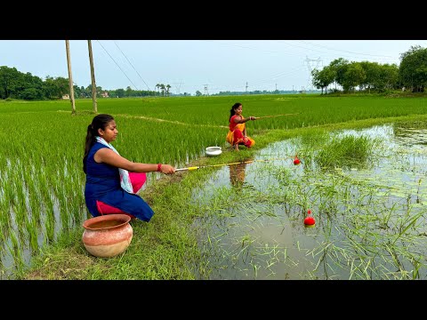 Fishing Video || Two beautiful lady are happily fishing in a pond in the middle of a field