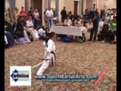 Extremely cute 9 year-old martial arts girl with perfect basics in Karate Kobudo