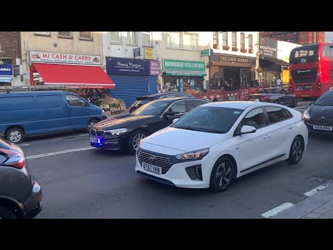 Metropolitan police BMW 530i Unmarked Traffic car Responding