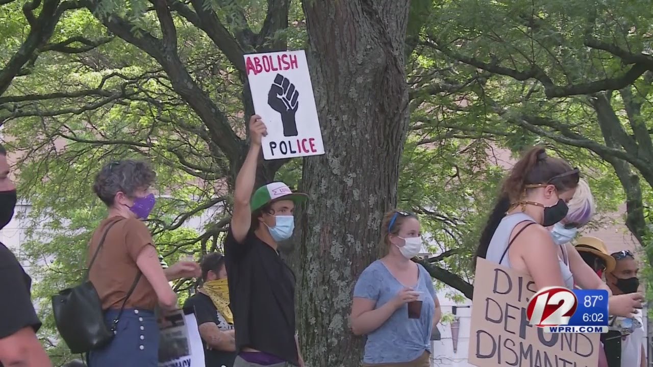 Protesters rally outside the RI State House against police brutality ...