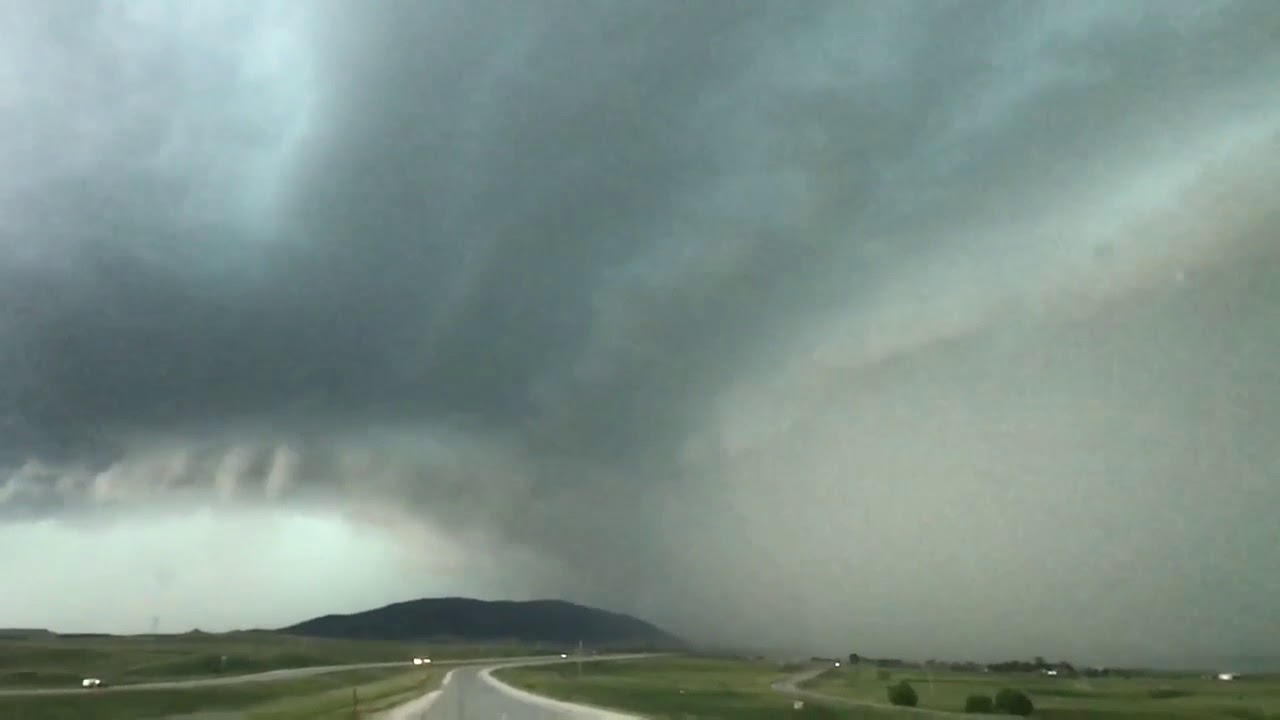 DESTRUCTIVE hail busts out window near Sundance, WY on I90! - YouTube