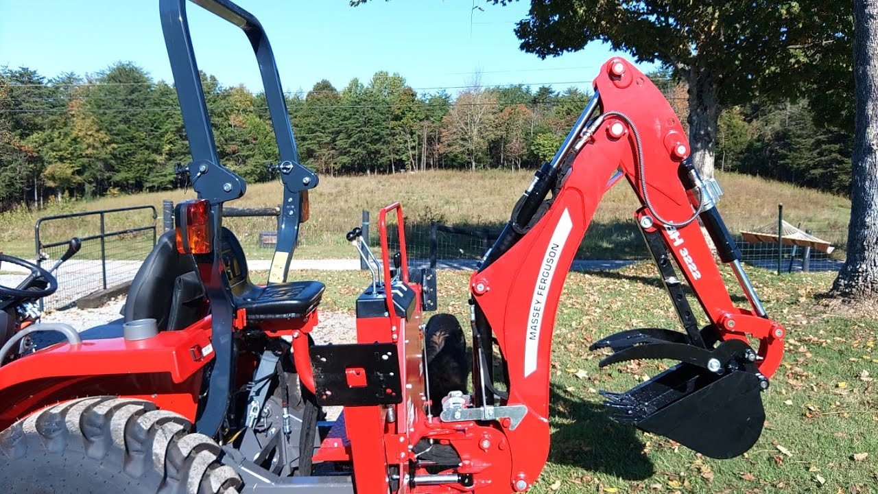 Disconnecting a backhoe attachment on a Massey Ferguson 1835E - YouTube