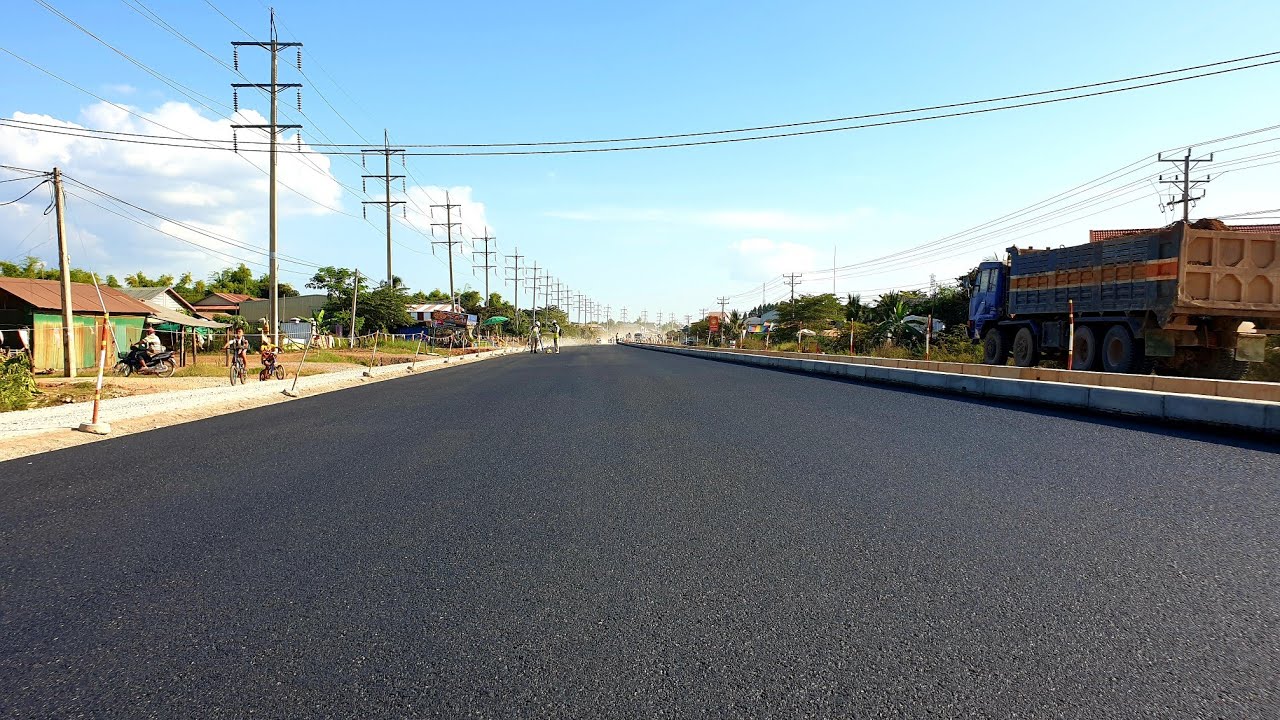 AC binder course after paved. - YouTube