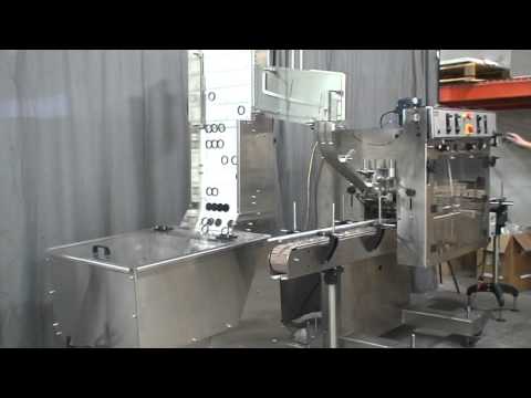 Inline capper with waterfall feeder 4 spindle serial 1619 - YouTube