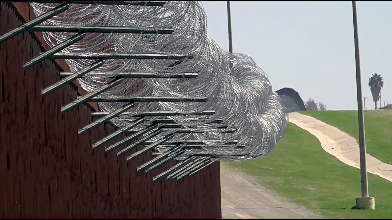 U.S. Military increases border security with concertina wire - YouTube