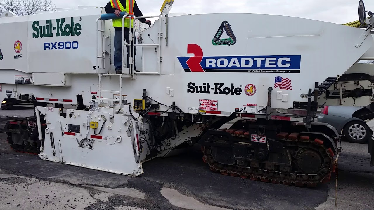 RX 900 12 inch cut (4" blacktop + 8" concrete) - YouTube