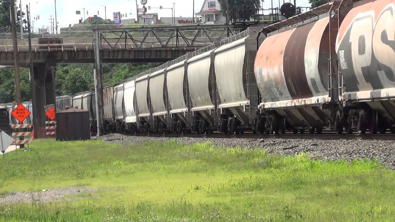 NS #9616, BNSF ES44AC #5754, NS ES44AC #7549 & John Deere flat car ...