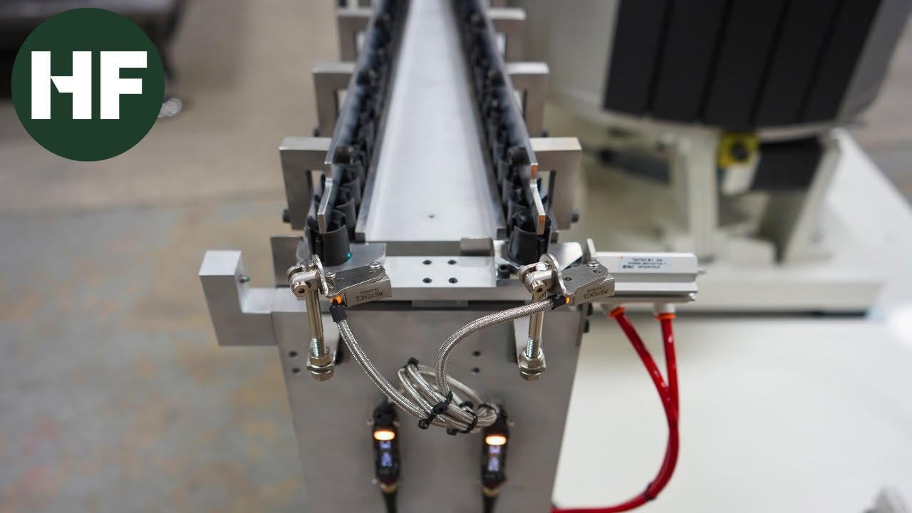 Vibratory Feeder with Dual Lane Isolation Cross Shuttle Orientates ...