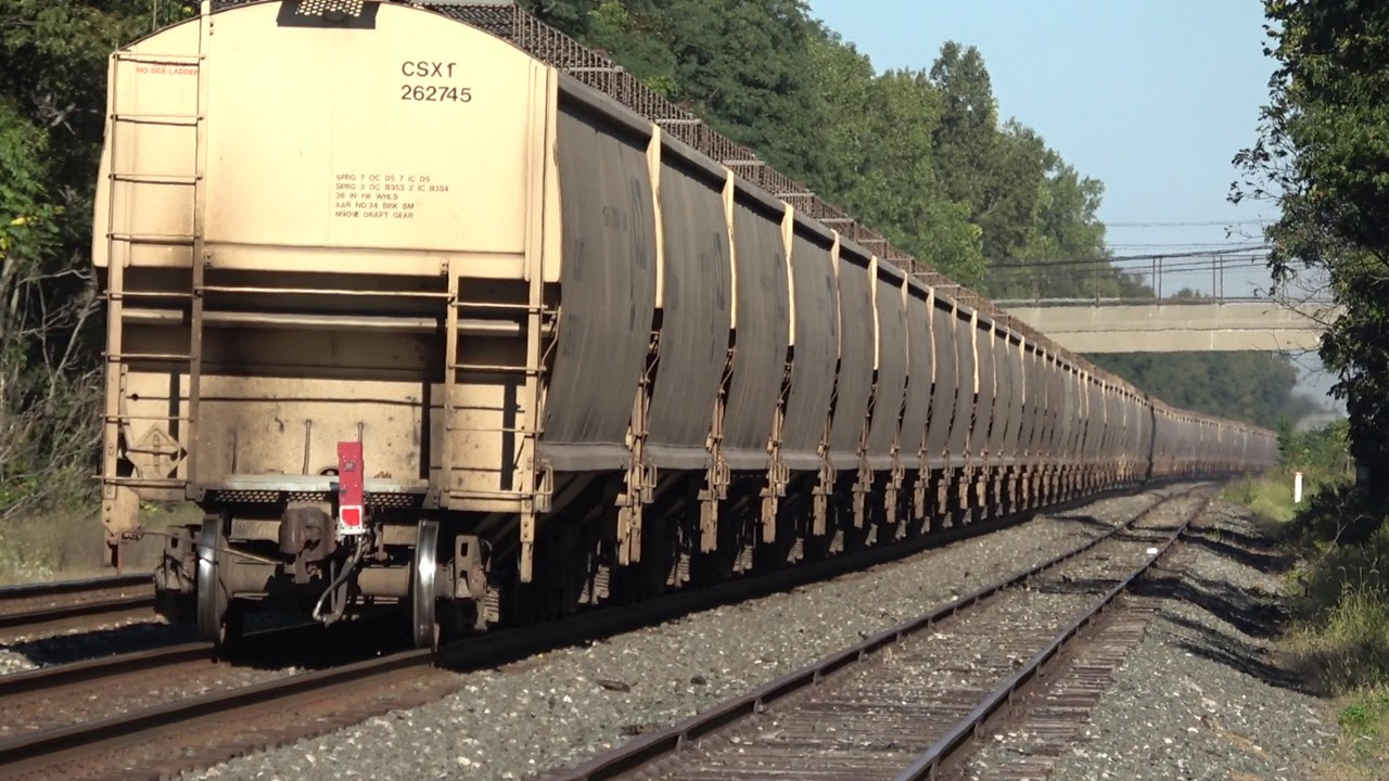Filming in Between 2 Big Fast Freight Trains 4K - YouTube