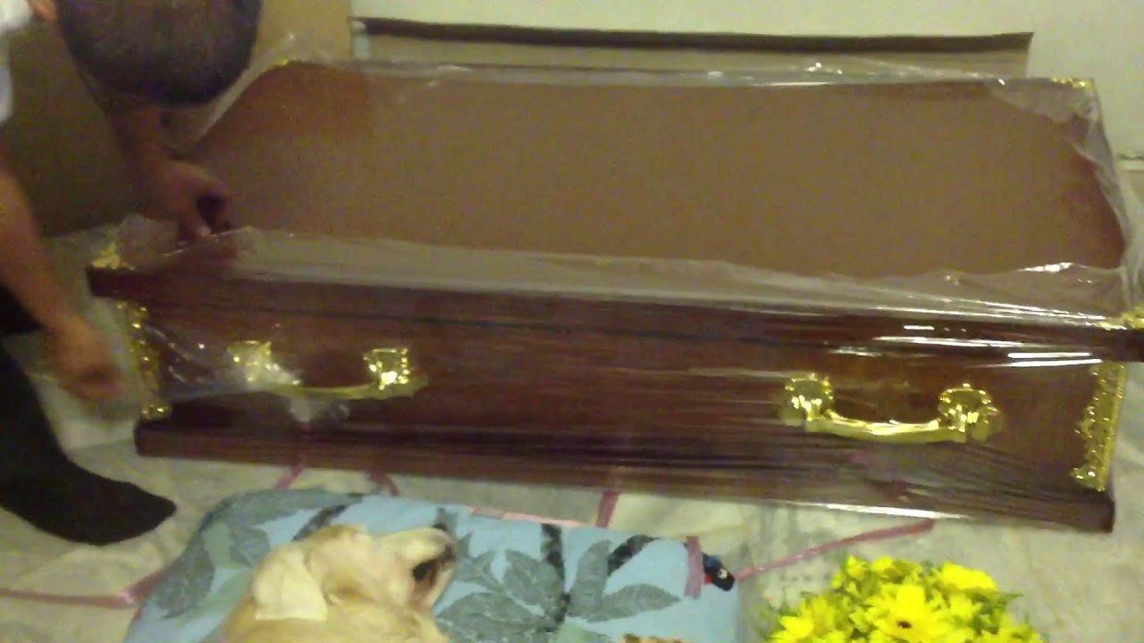 Wrapping up a coffin - YouTube