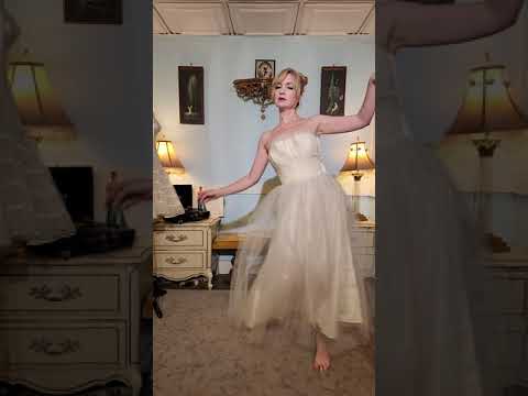 Dainty rascal dancing in white lingerie